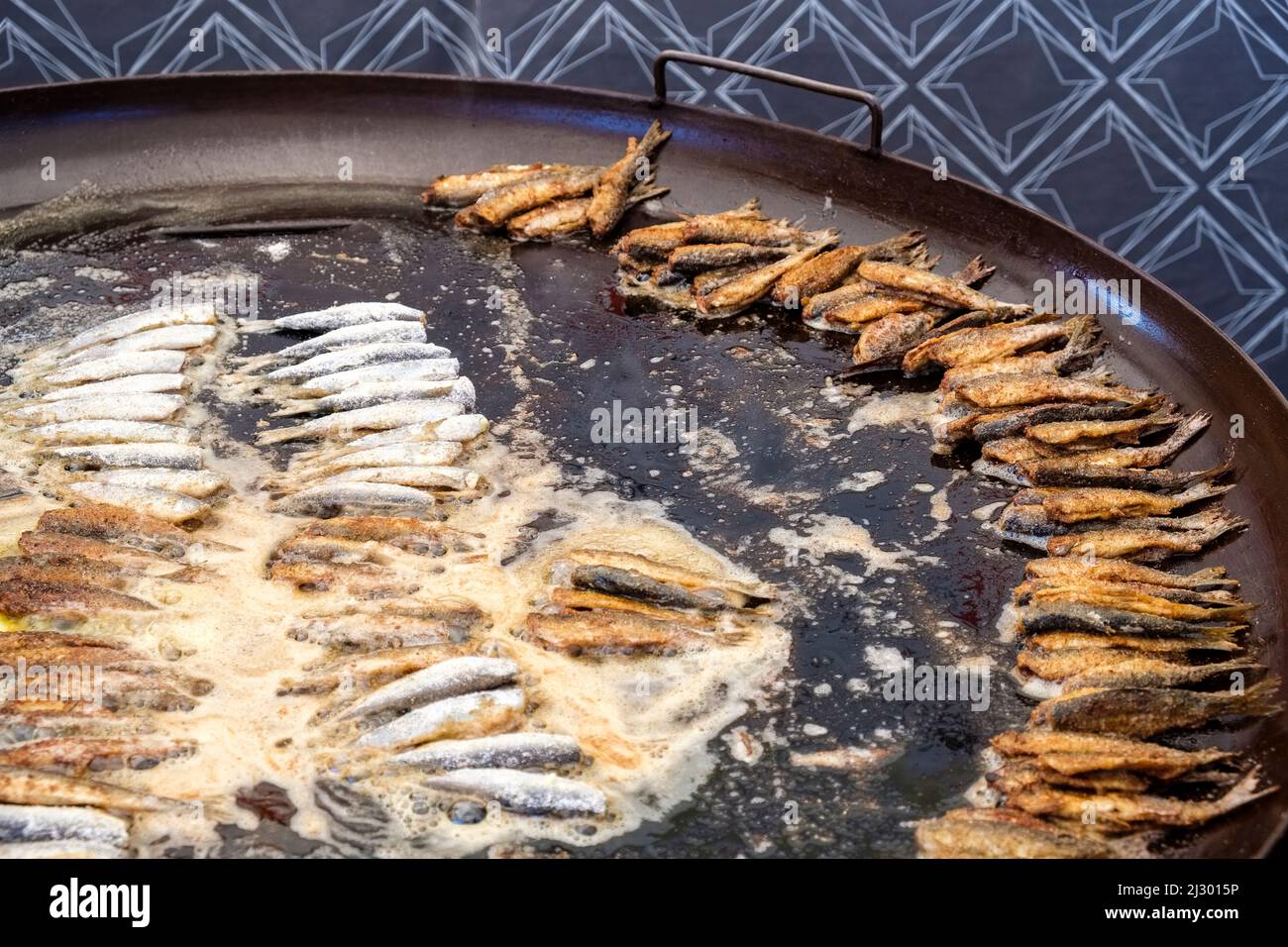 Freshly fried sprats in the market in Joensuu, Finland Stock Photo - Alamy