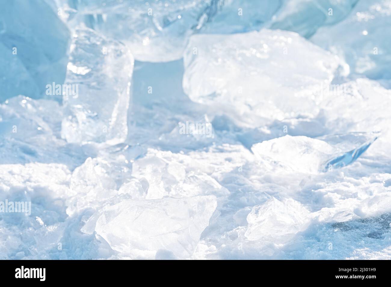 Ice hummocks on Baikal Lake. Transparent blue ice floe at sunset ...