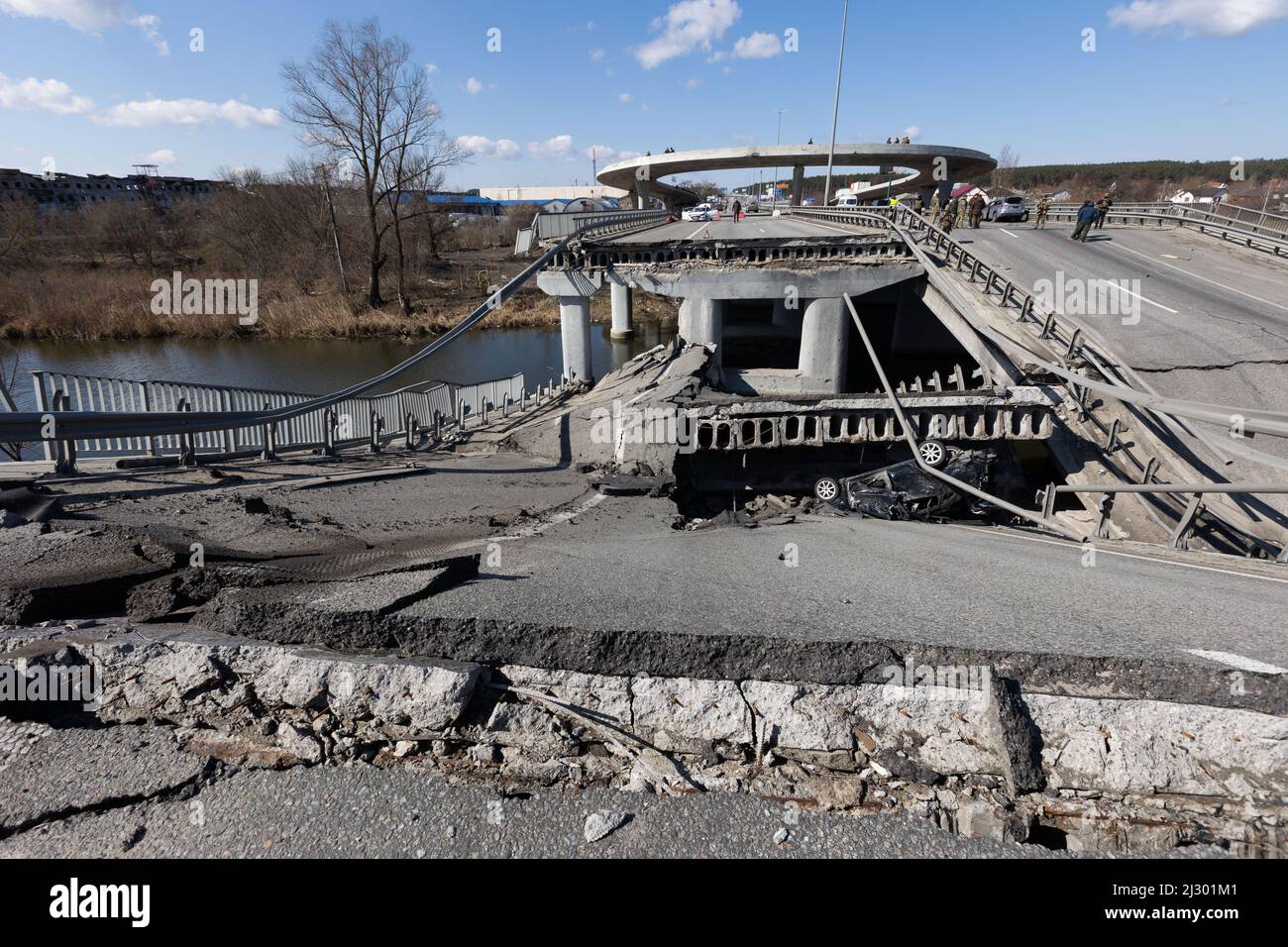 Bucha, Kyiv Region, Ukraine. 4th Apr, 2022. Destroyed roads and debris ...