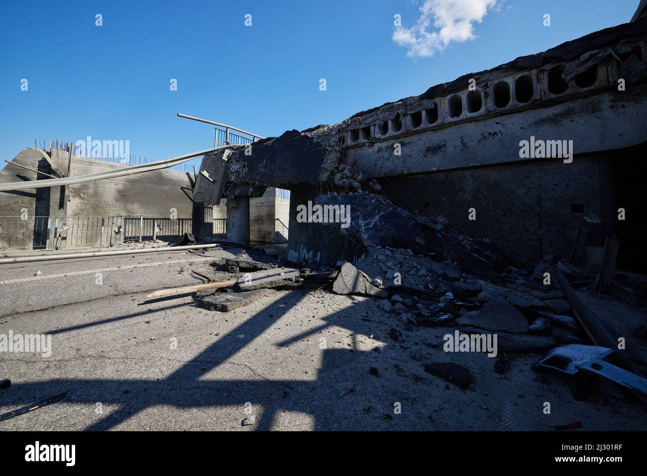 Bucha, Kyiv Region, Ukraine. 4th Apr, 2022. Destroyed roads and debris ...