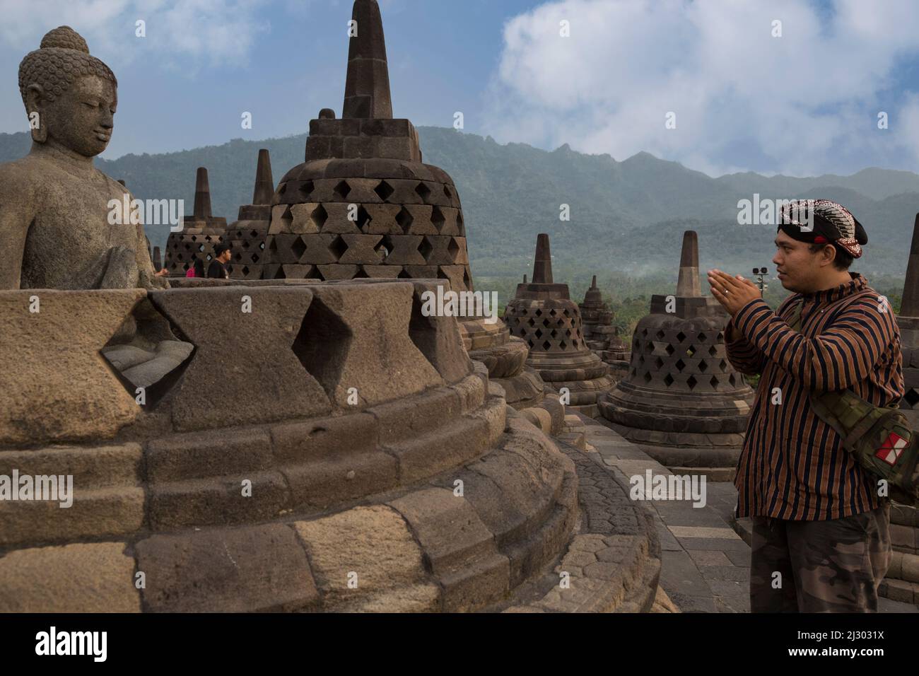 Buddhist praying stone hi-res stock photography and images - Alamy