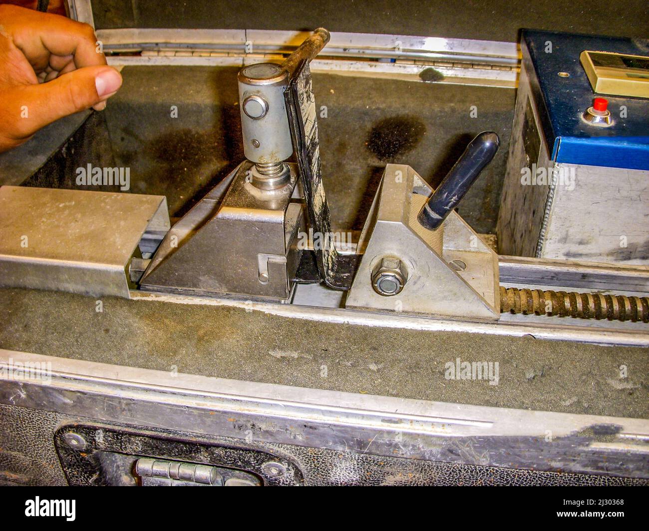 destructive stress test being done on a HDPE welded liner for a ...