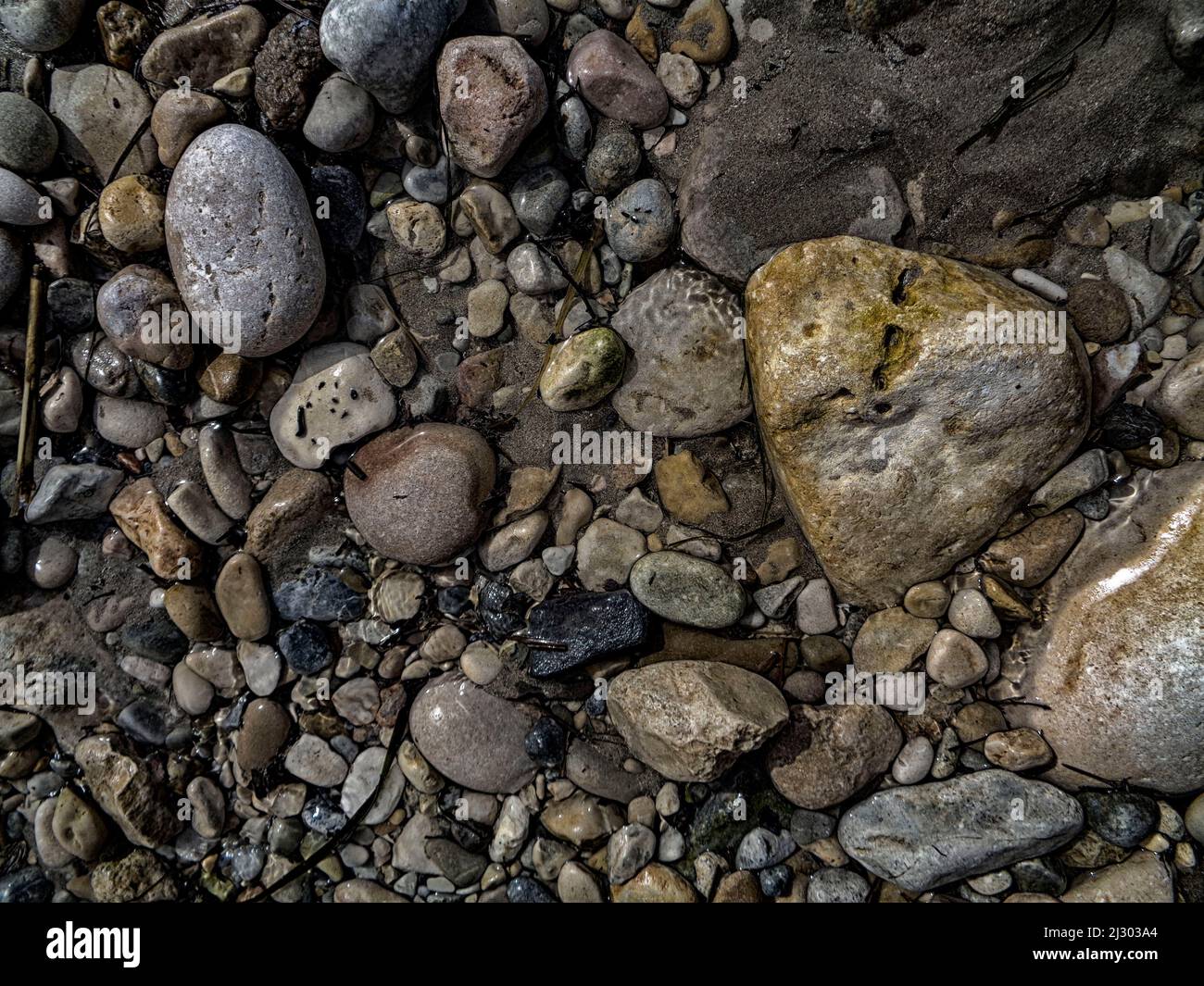 Random patterns in nature, small beach pebbles on the Costa Blanca ...
