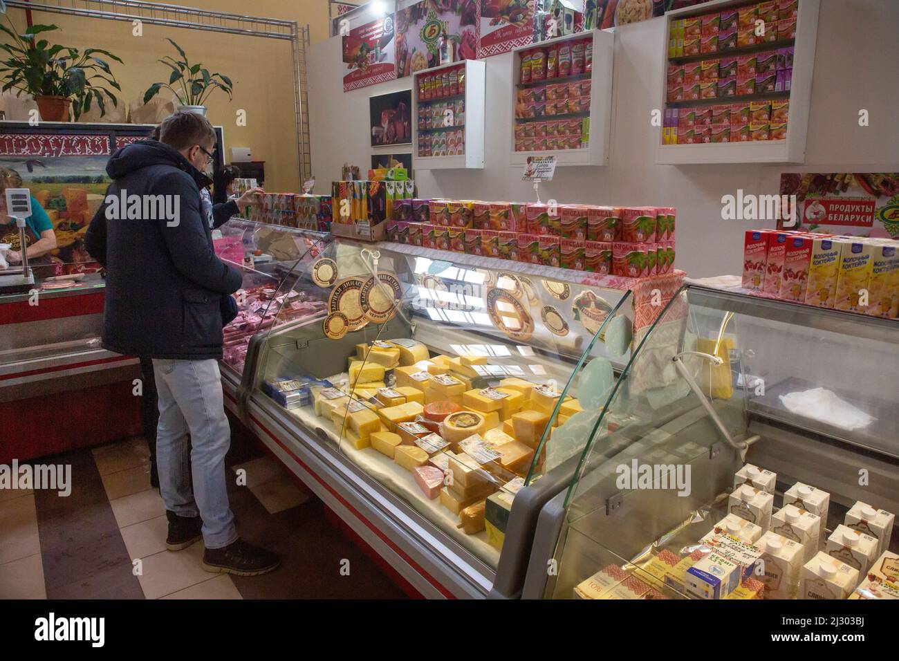 Moscow, Russia. 3rd of April, 2022. A visitor chooses cheese in the ...