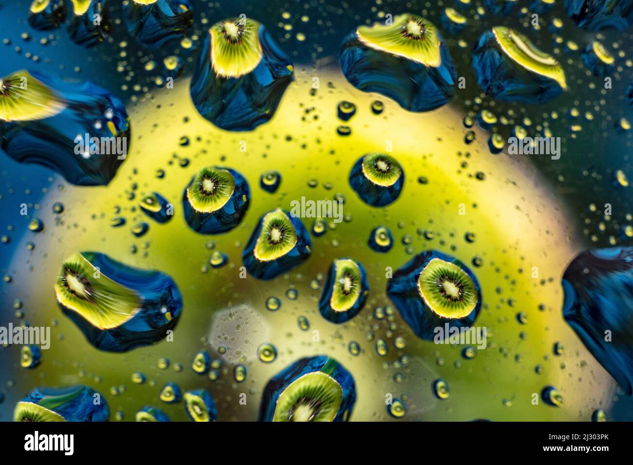 Macro creative food still-life showing Kiwi fruit reflected in shapely ... Macro creative food still-life showing Kiwi fruit reflected in shapely ...