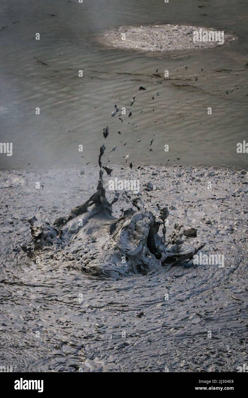 A vertical shot of boiling mud pools, Wai -O-Tapu, Waikato, New Zealand ...