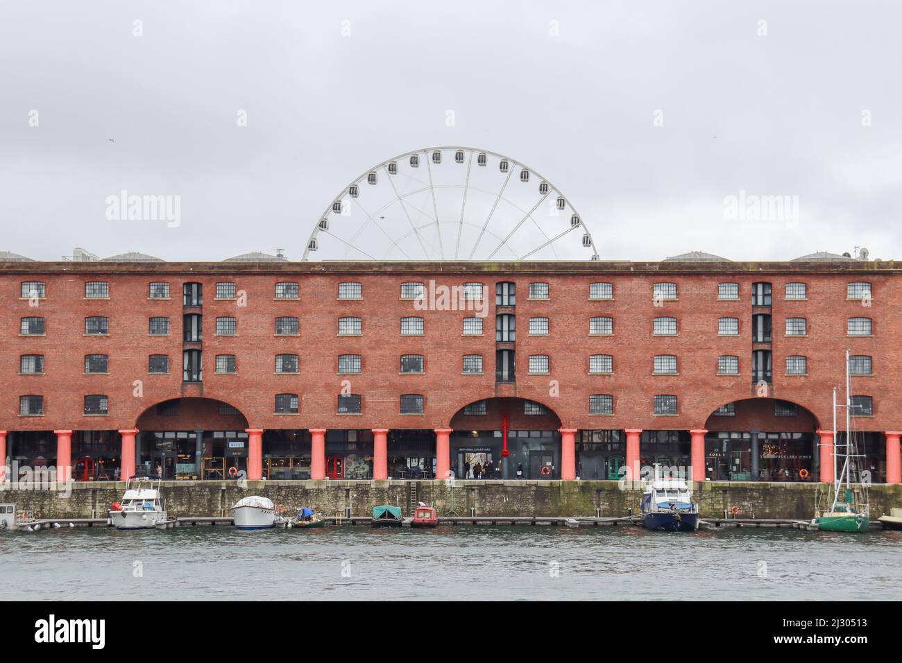 View of Albert Dock with Liverpool Wheel Stock Photo - Alamy