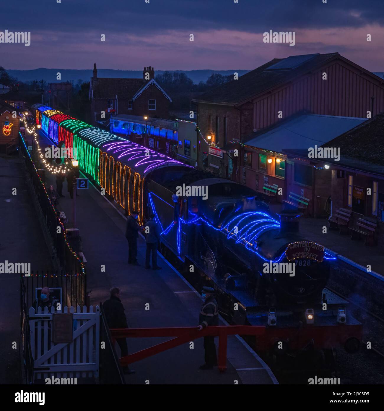 Locomotive 7828 Odney Manor pulling the illuminated 'Winter Lights' Christmas special passenger ...