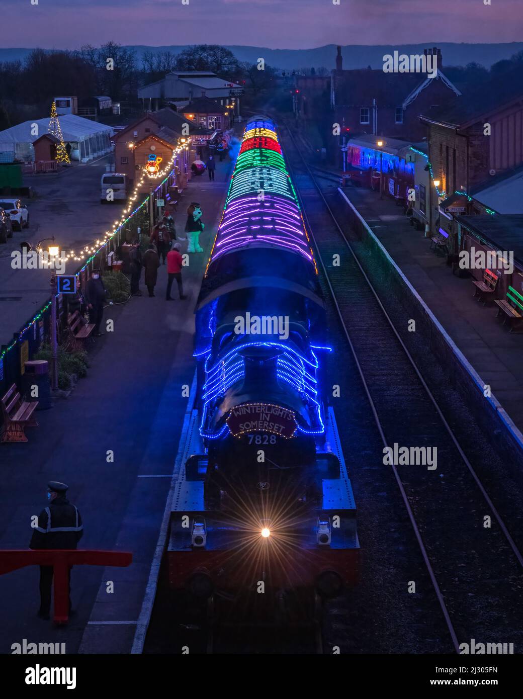 Locomotive 7828 Odney Manor pulling the illuminated 'Winter Lights' Christmas special passenger ...