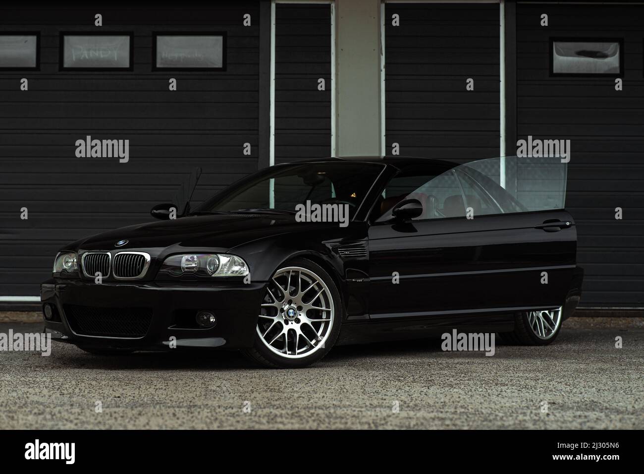 A black luxurious BMW M3 2002 with the door open, central Sweden Stock ...
