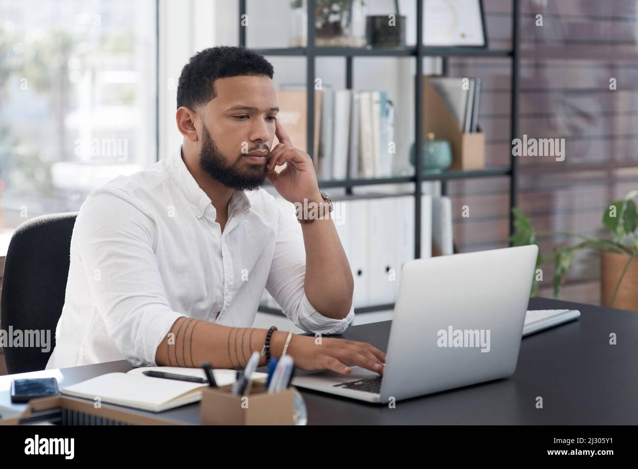 I need to complete all my deadlines today. Shot of a young businessman ...