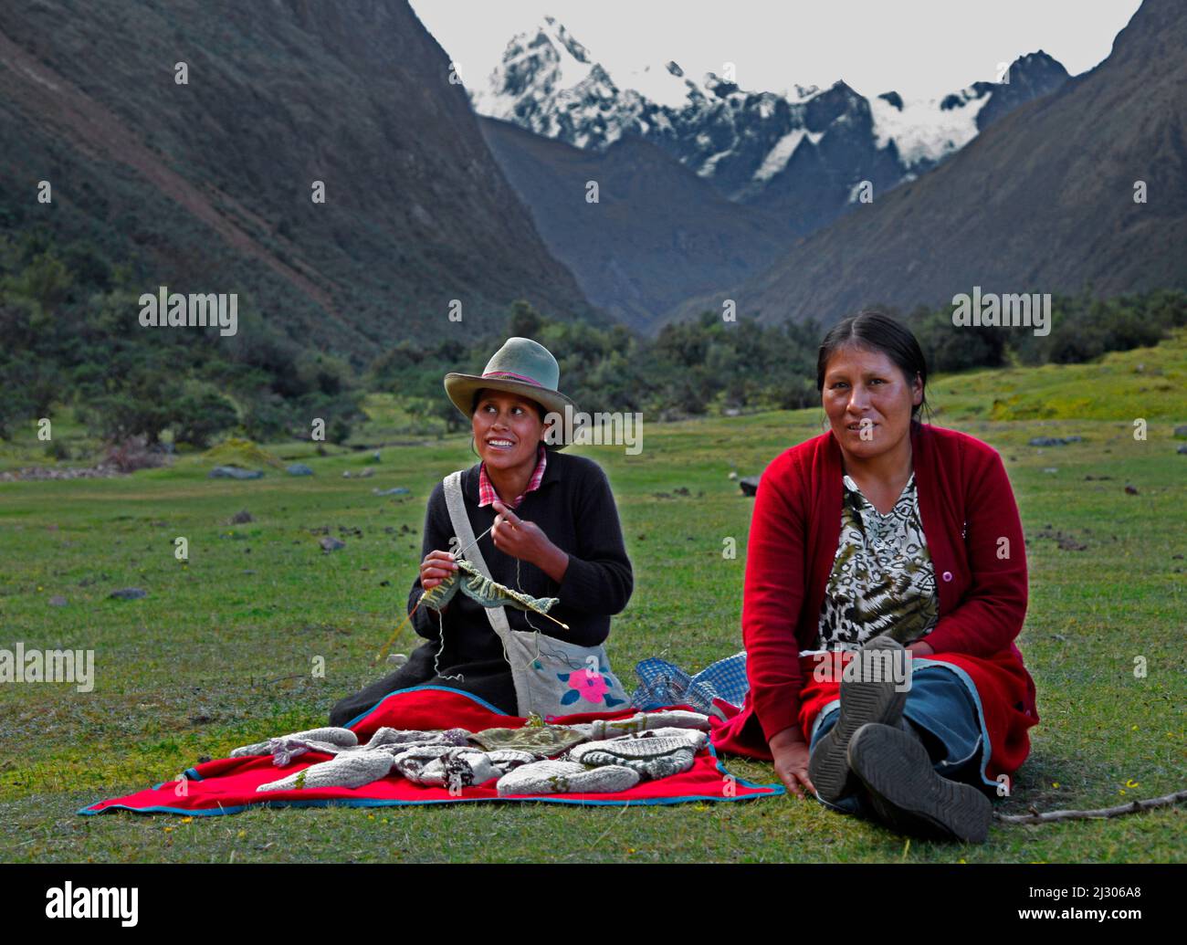 Peruvian women knitting and selling hats, Santa Cruz Trek, Cordillera ...