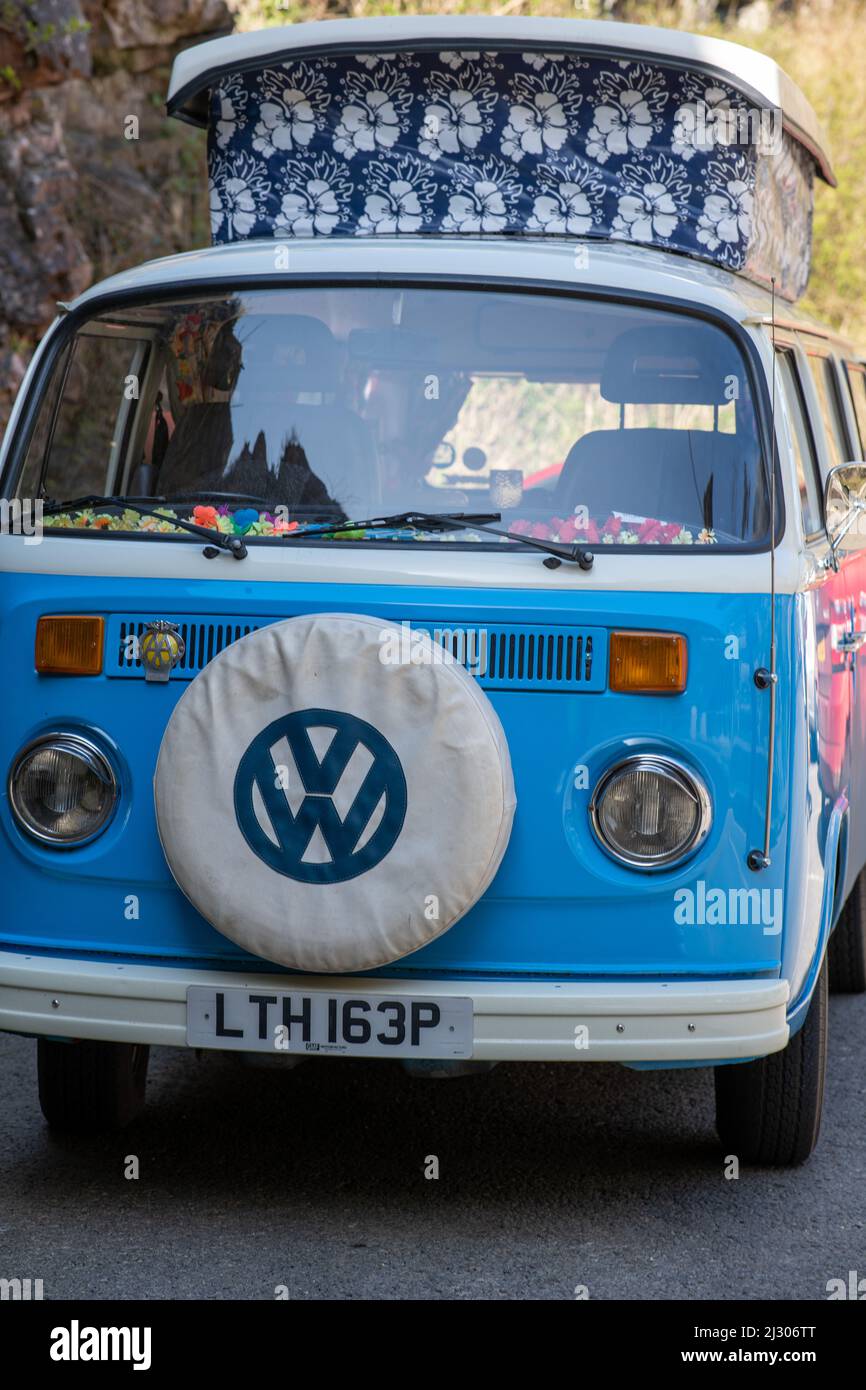 A vertical shot of 1970 blue Volkswagen microbus Stock Photo - Alamy