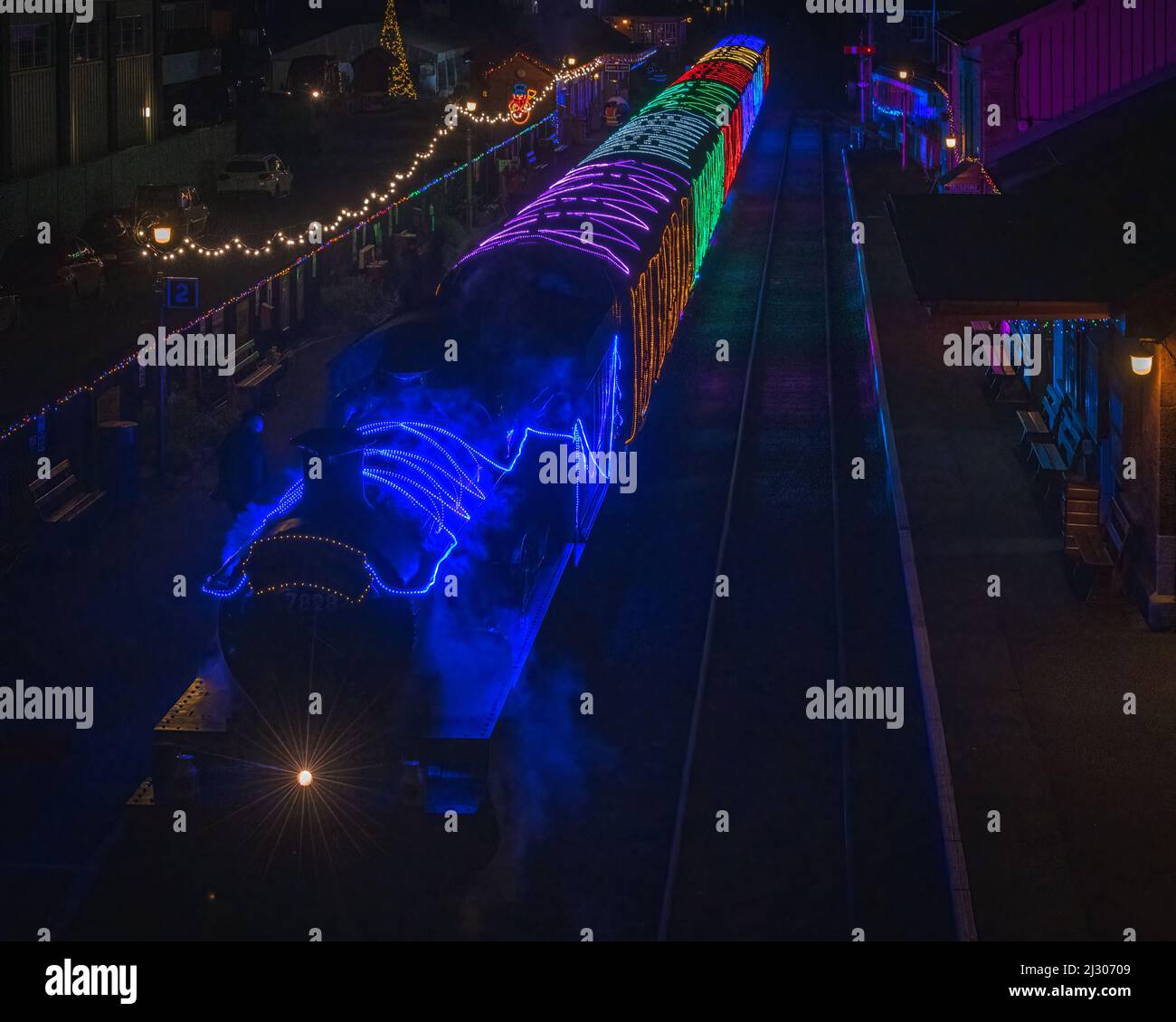 Locomotive 7828 Odney Manor pulling the illuminated 'Winter Lights' Christmas special passenger ...