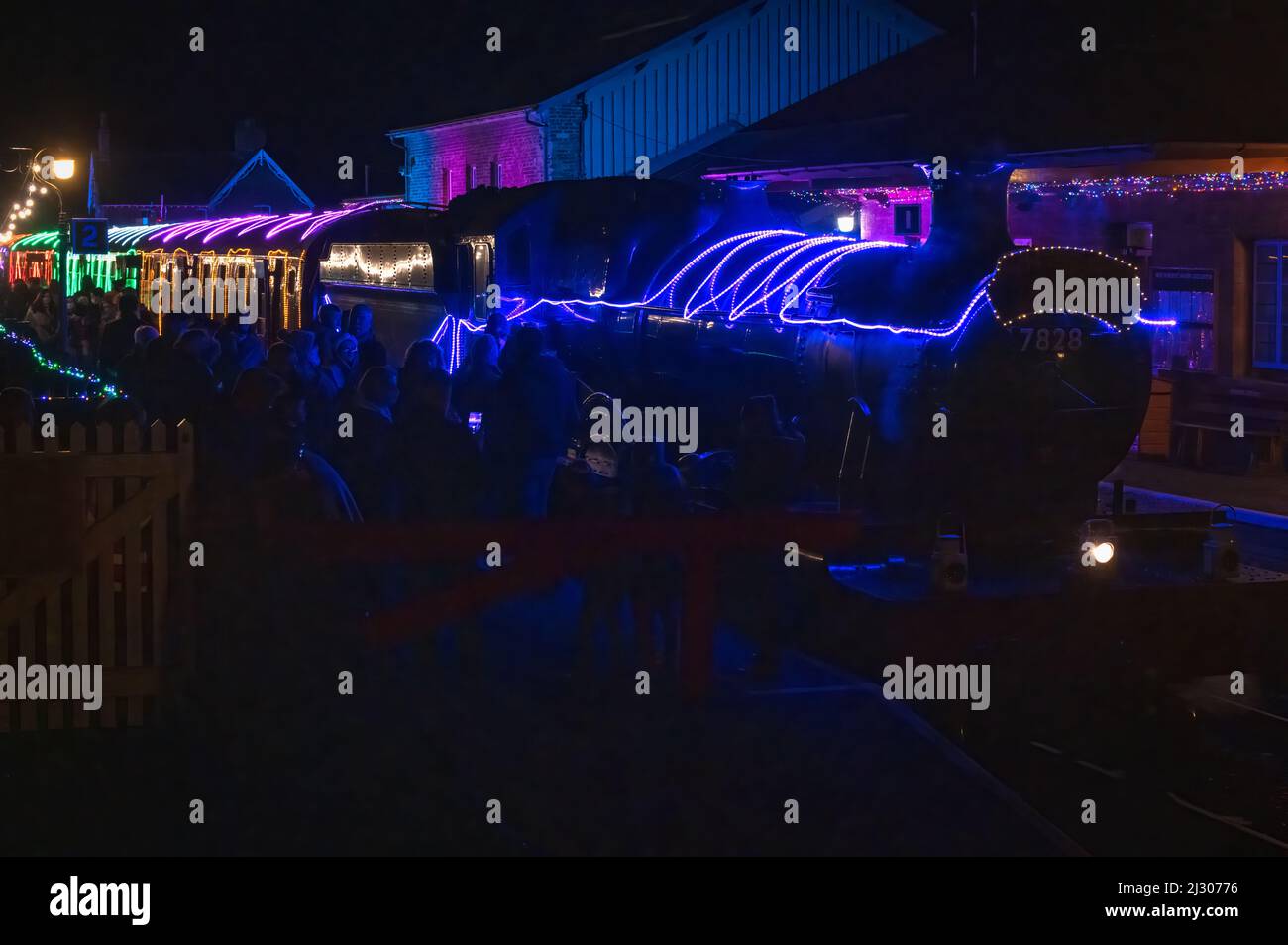 Locomotive 7828 Odney Manor pulling the illuminated 'Winter Lights' Christmas special passenger ...