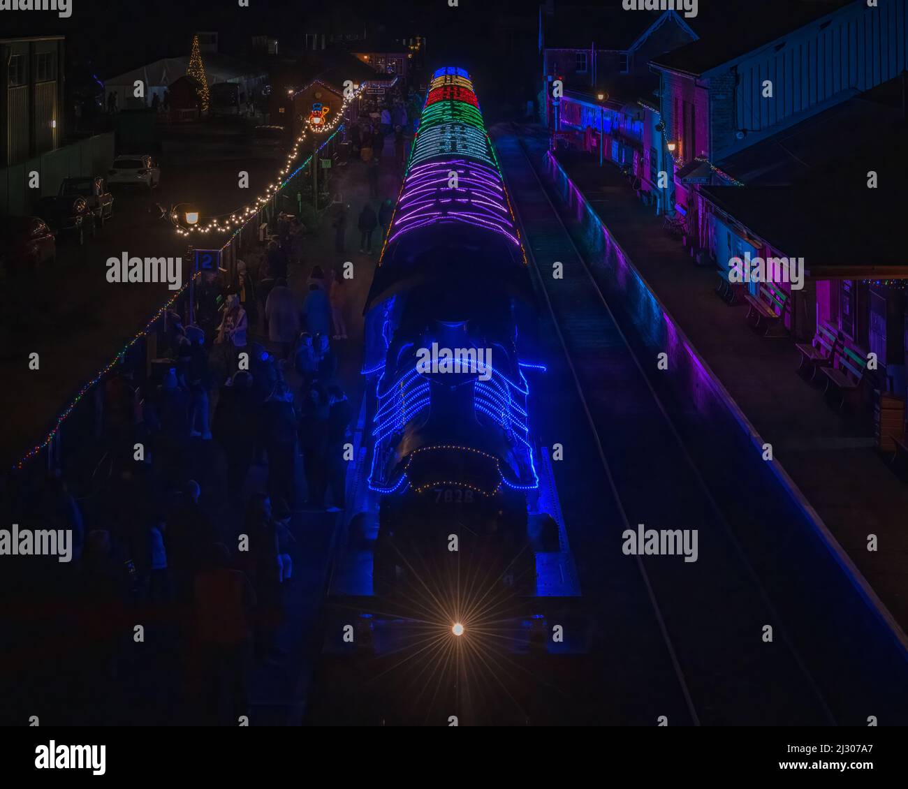 Locomotive 7828 Odney Manor pulling the illuminated 'Winter Lights' Christmas special passenger ...
