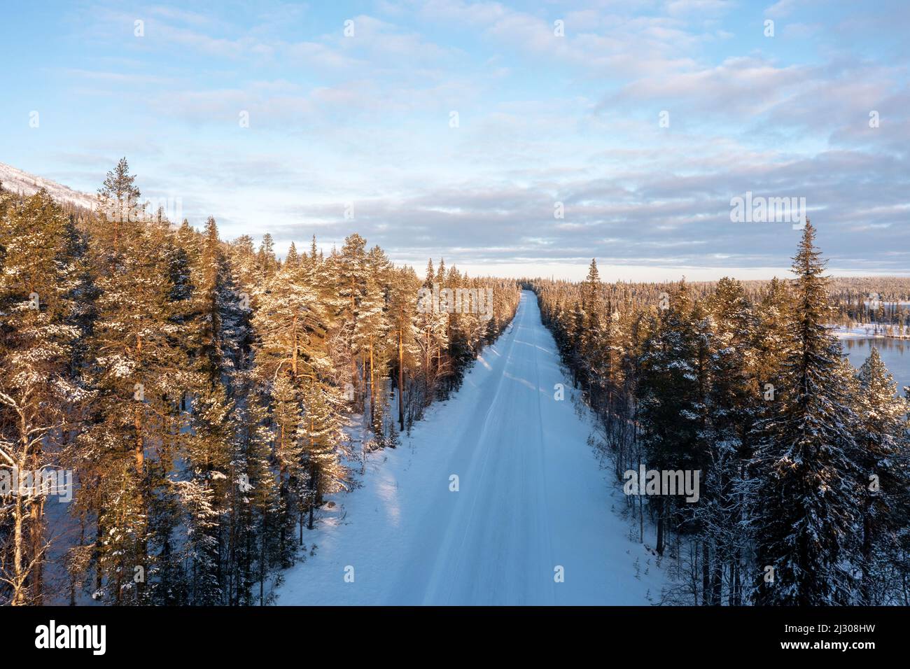 Snow-covered road at Särkijervi, Muonio, Lapland, Finland Stock Photo ...