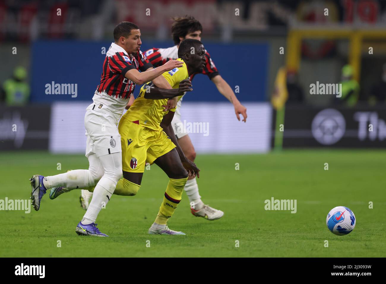 Milan, Italy, 4th April 2022. Musa Barrow of Bologna FC ties on Ismael ...
