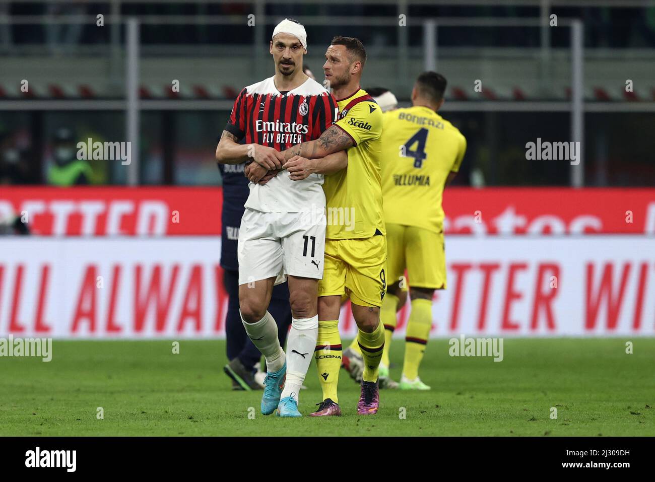 San Siro stadium, Milan, Italy, April 04, 2022, Marko Arnautovic (Bologna FC) hugs Zlatan ...
