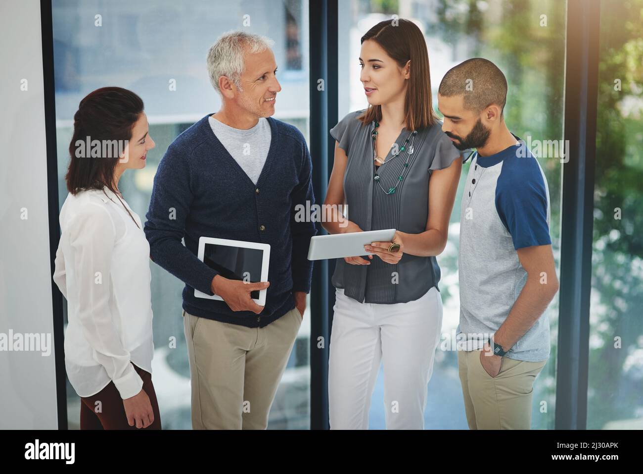 Design office teamwork discussions hi-res stock photography and images ...