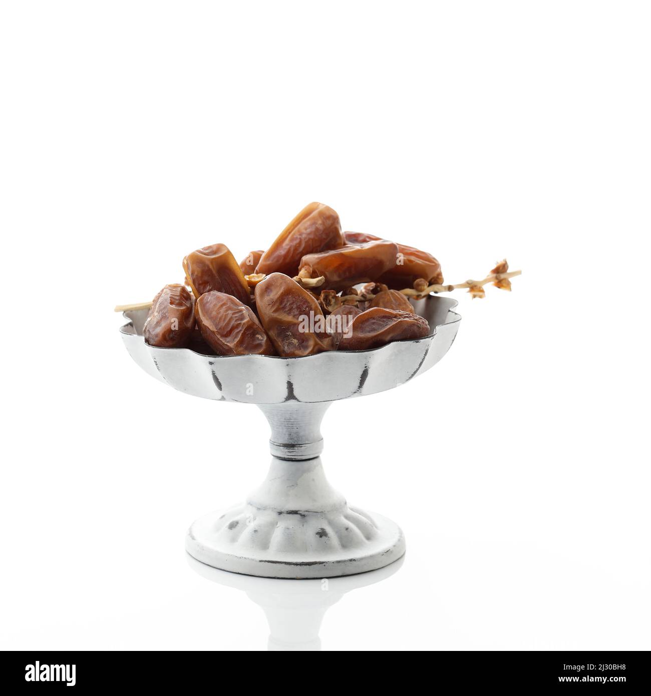 Dried Tunisian Dates with Stalk, Isolated on White Stock Photo - Alamy