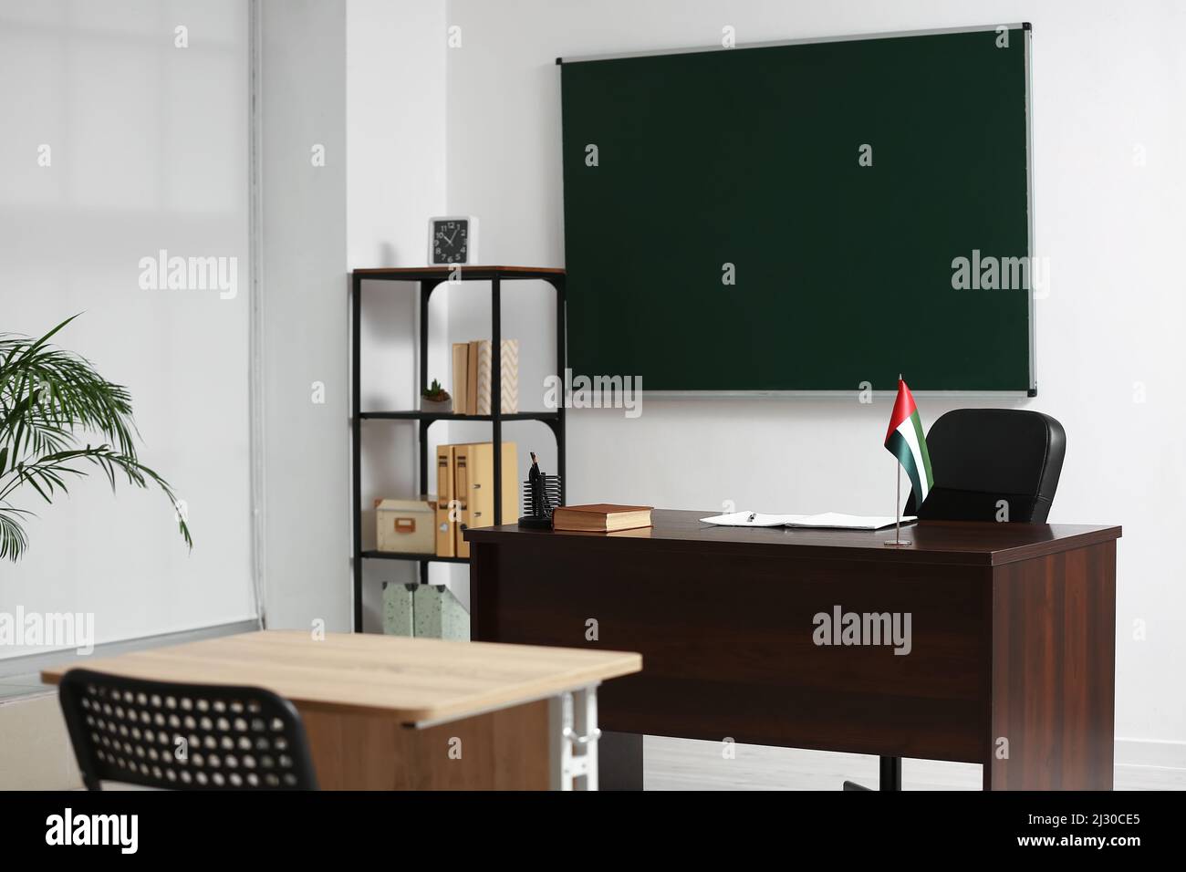Interior of classroom with UAE flag Stock Photo - Alamy