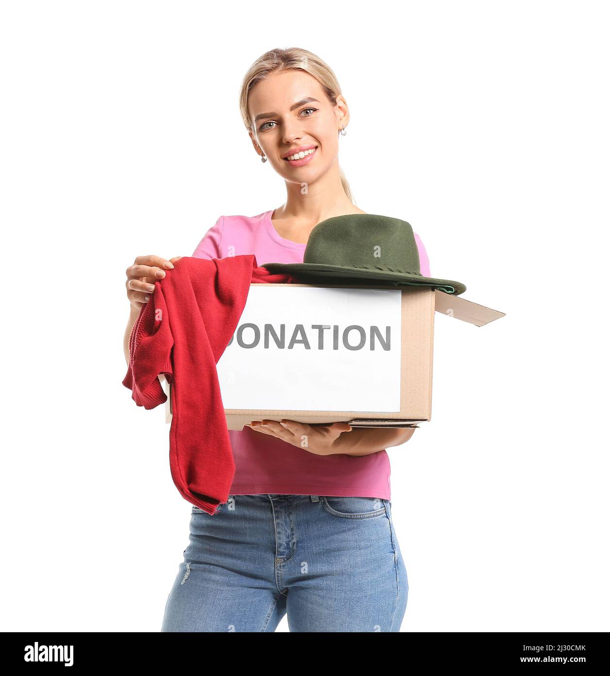 Beautiful woman holding box with donations on white background Stock ...