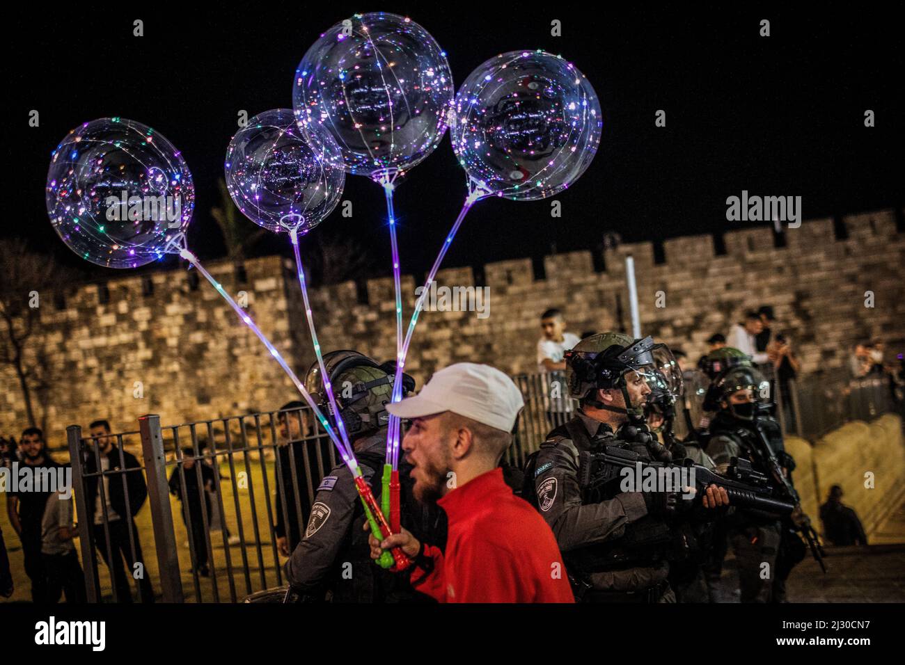 Jerusalem, Palestinian Territories. 04th Apr, 2022. A Palestinian sells ...