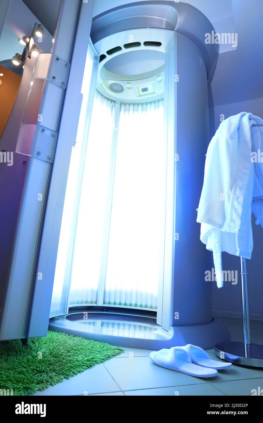 Modern solarium in beauty salon Stock Photo - Alamy