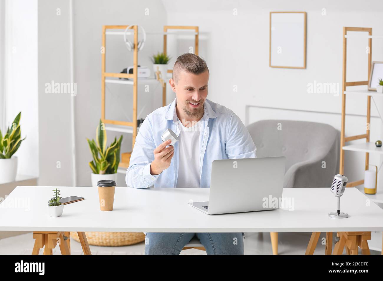 Workplace wireless portable speaker hi-res stock photography and images ...