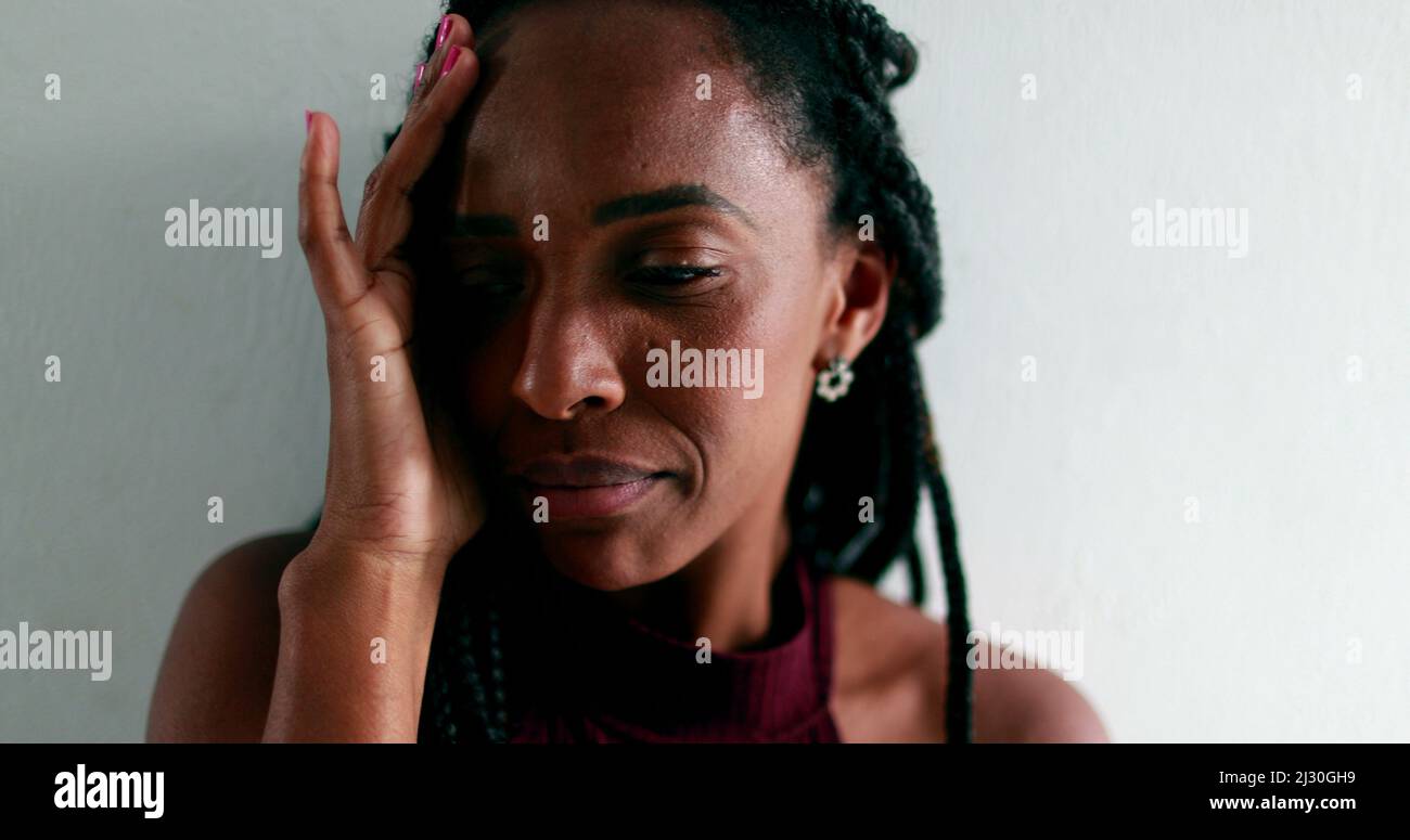 Worried black woman feeling anguish. anxious African female Stock Photo ...