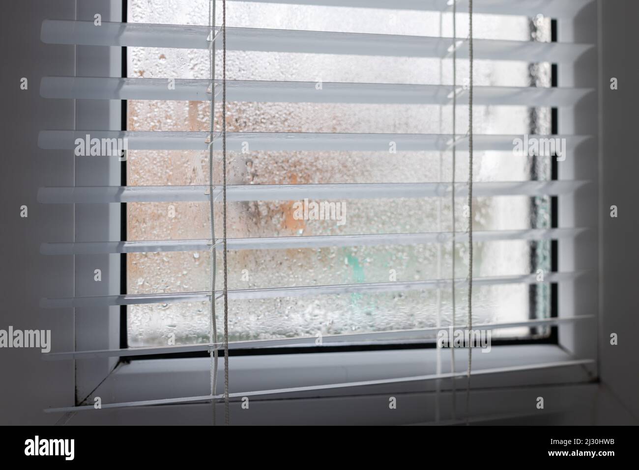 Glass of window with condensation, natural water drops on glass, high ...