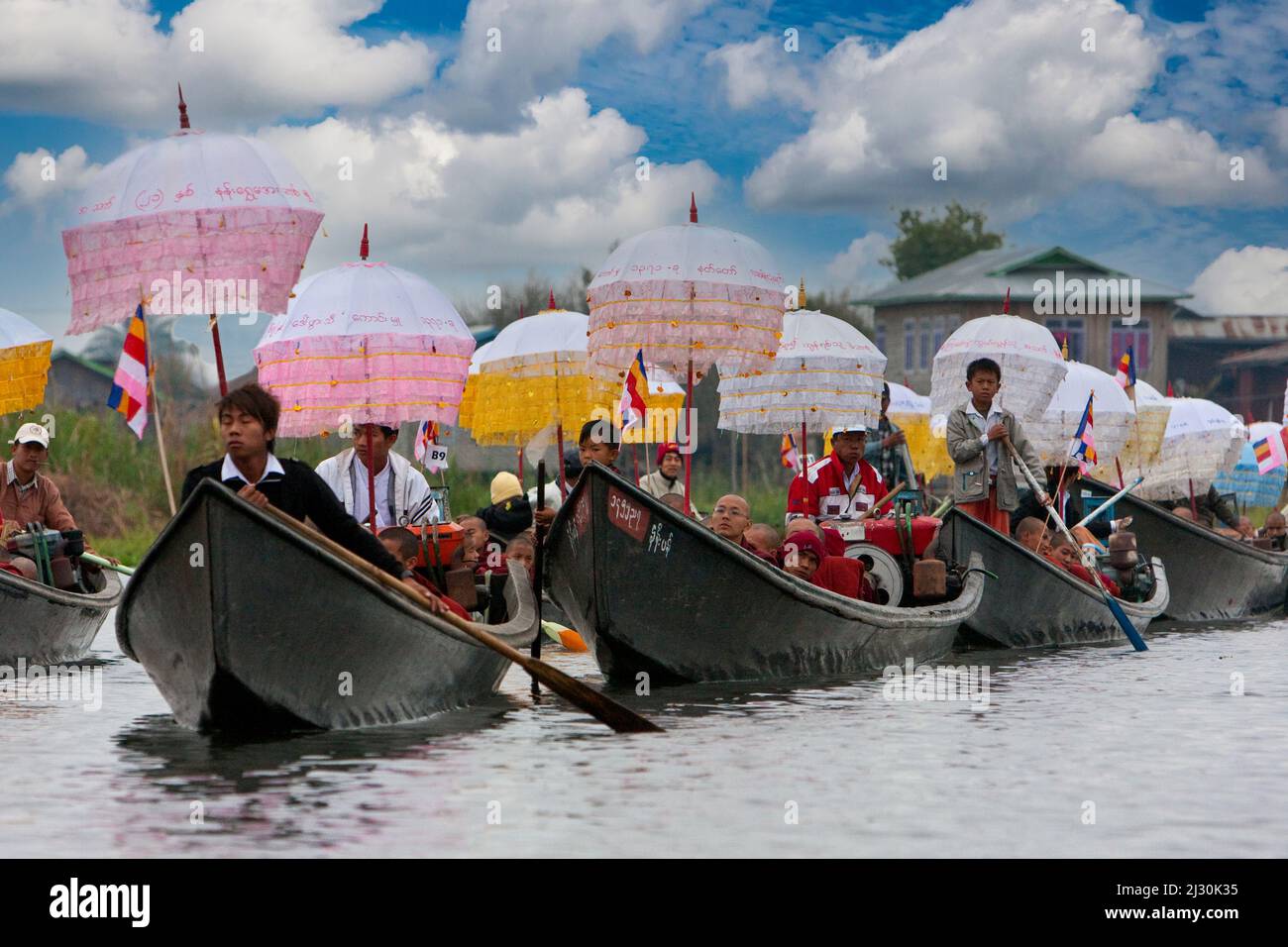 Myanmar, Burma. Burmese Monks in Boats en route to a Buddhist Ceremony ...