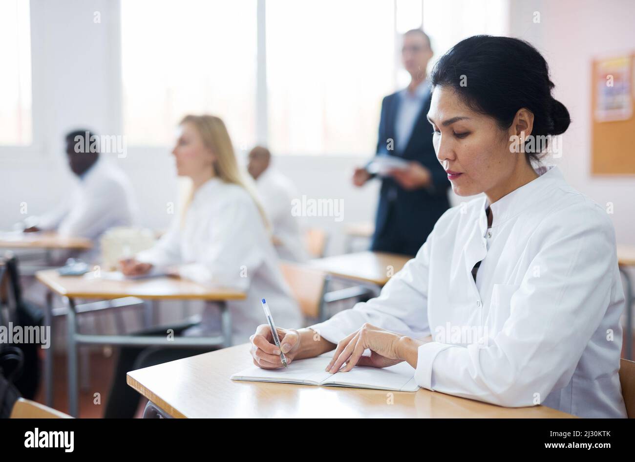 Group of medical academy students at lesson Stock Photo - Alamy
