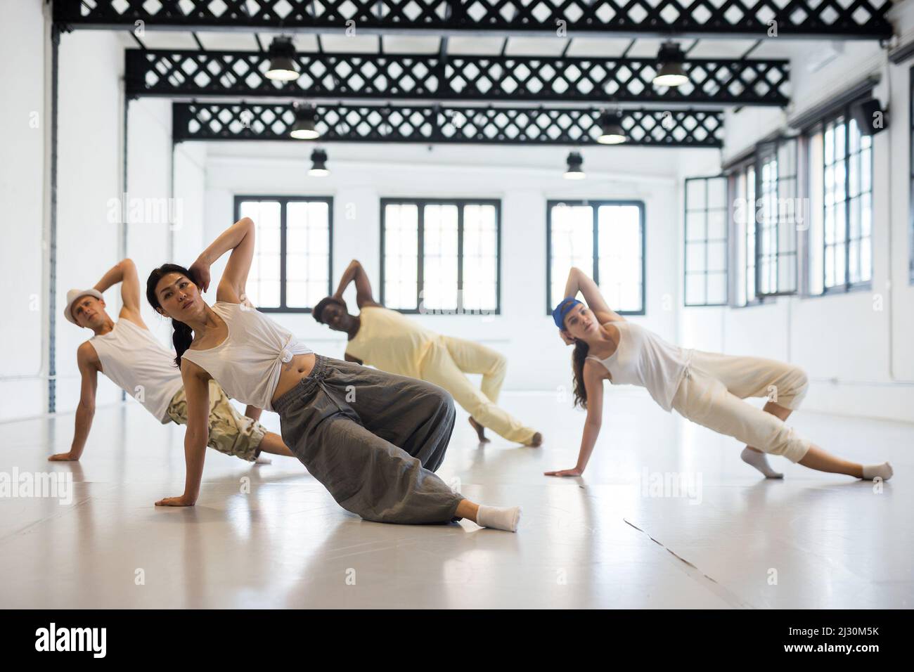 Group of people enjoying dancing together in studio Stock Photo - Alamy