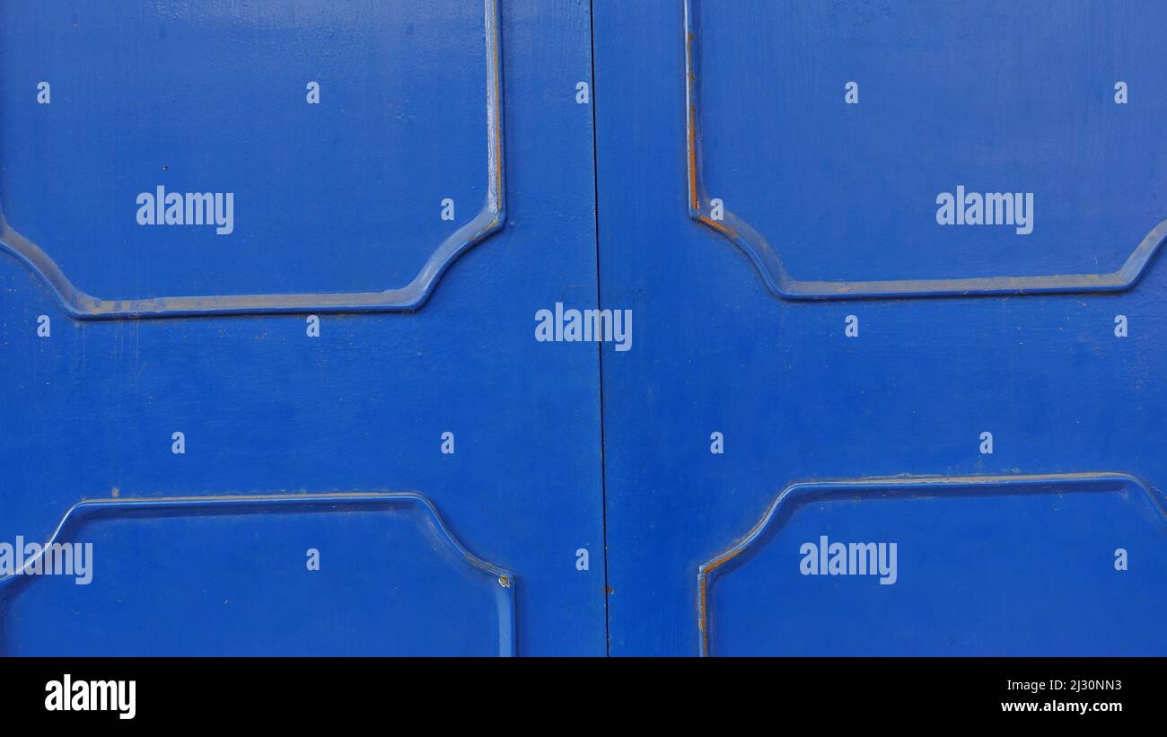 A blue, metal gate background with rectangular patterns Stock Photo - Alamy