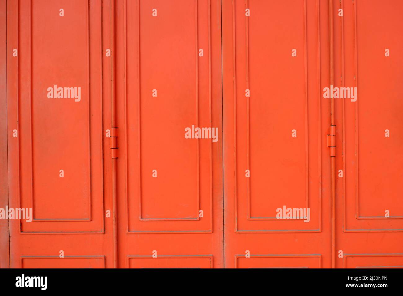 A metal, orange gate background with rectangular patterns Stock Photo ...