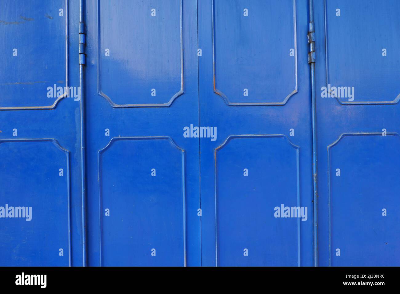 A blue, metal gate background with rectangular patterns Stock Photo - Alamy