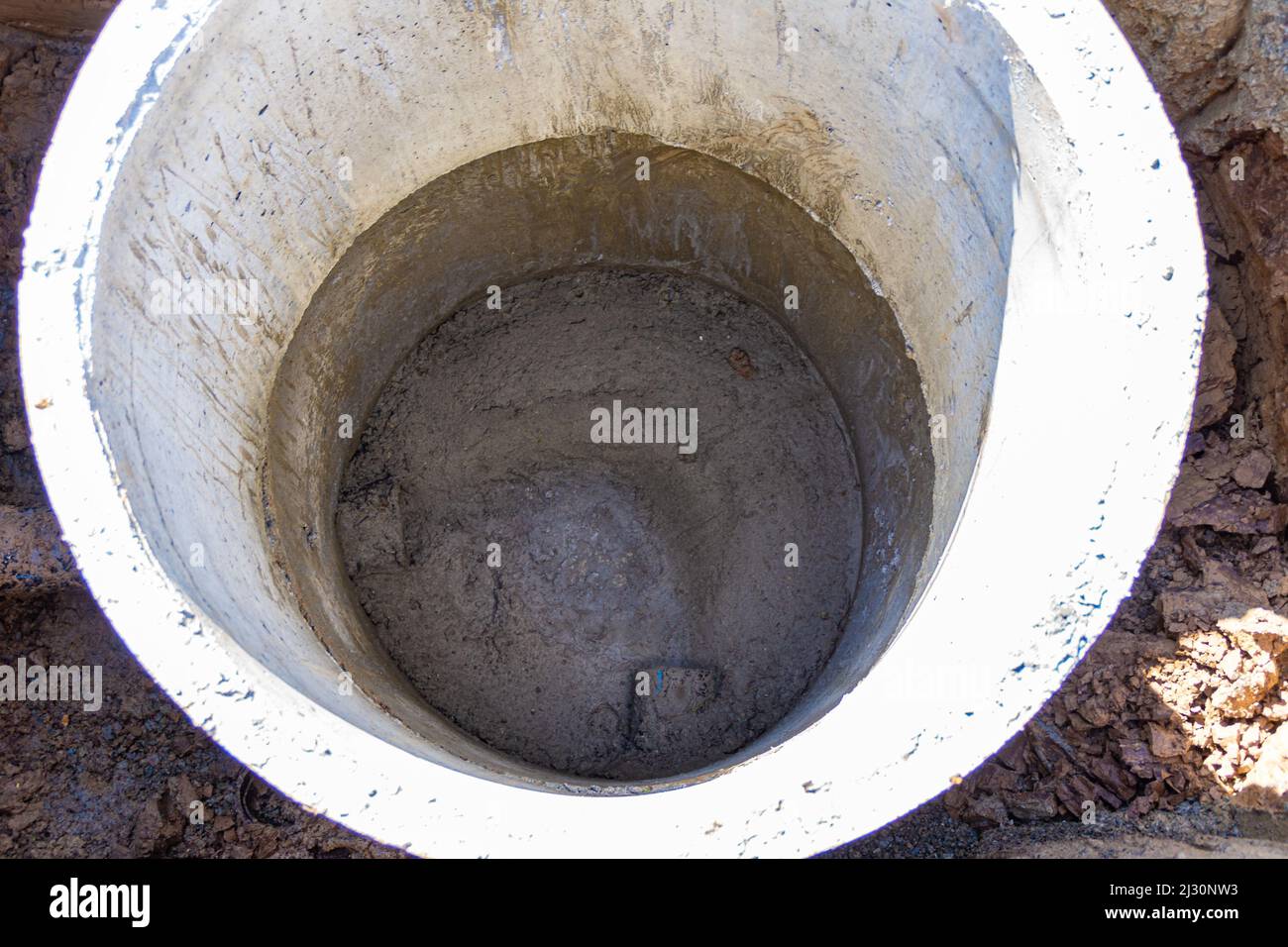 installation of a rotary well of a free-flow sewer for drainage, storm ...