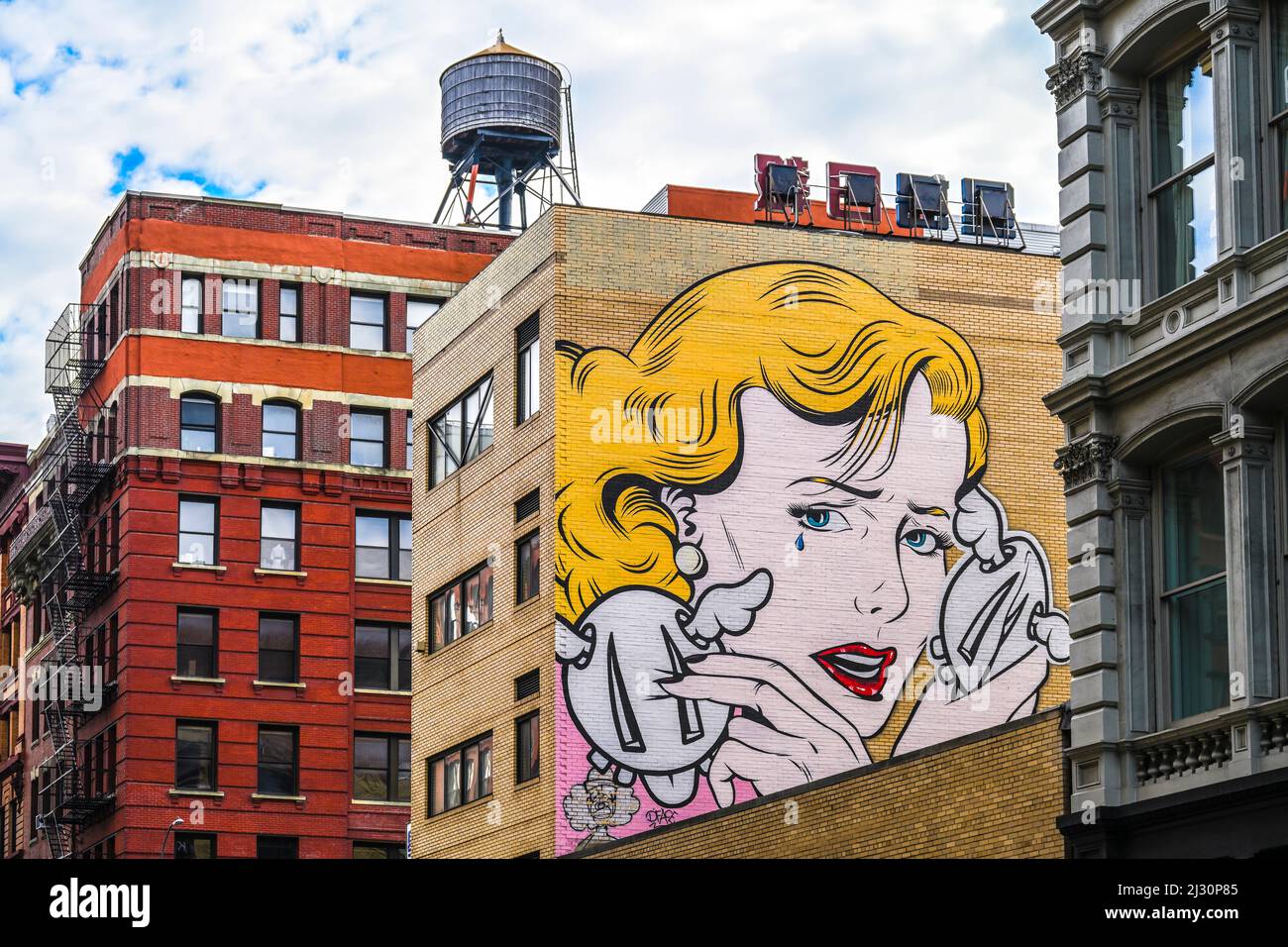 large painted mural on a building in Soho neighborhood in New York City ...