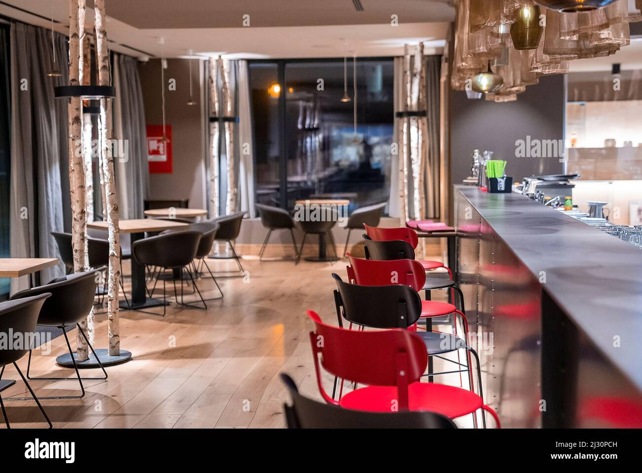 Row of empty chairs at bar counter in luxurious hotel Stock Photo - Alamy