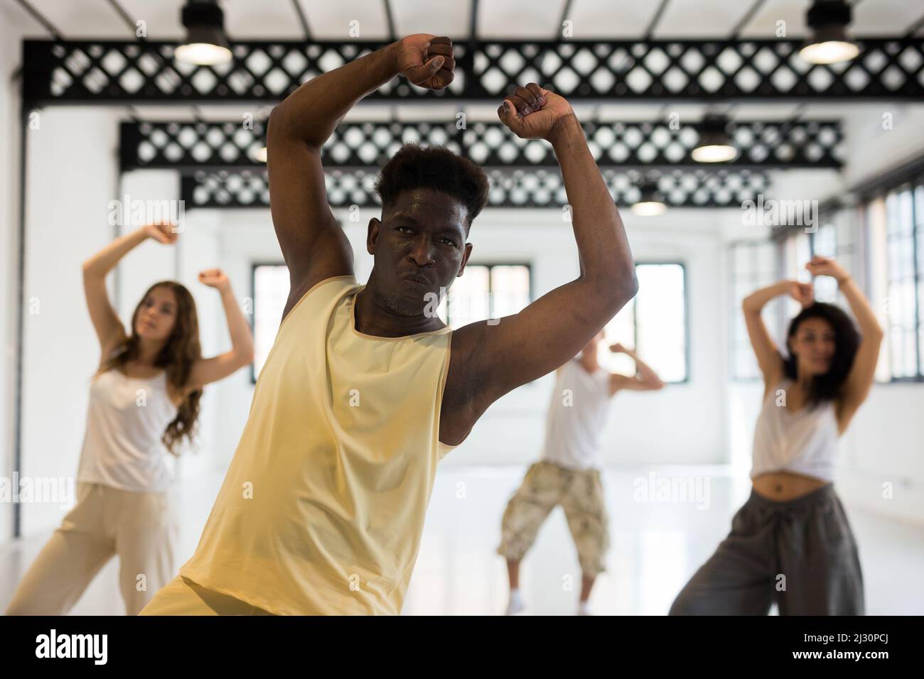 Dancers training modern dance movements Stock Photo - Alamy