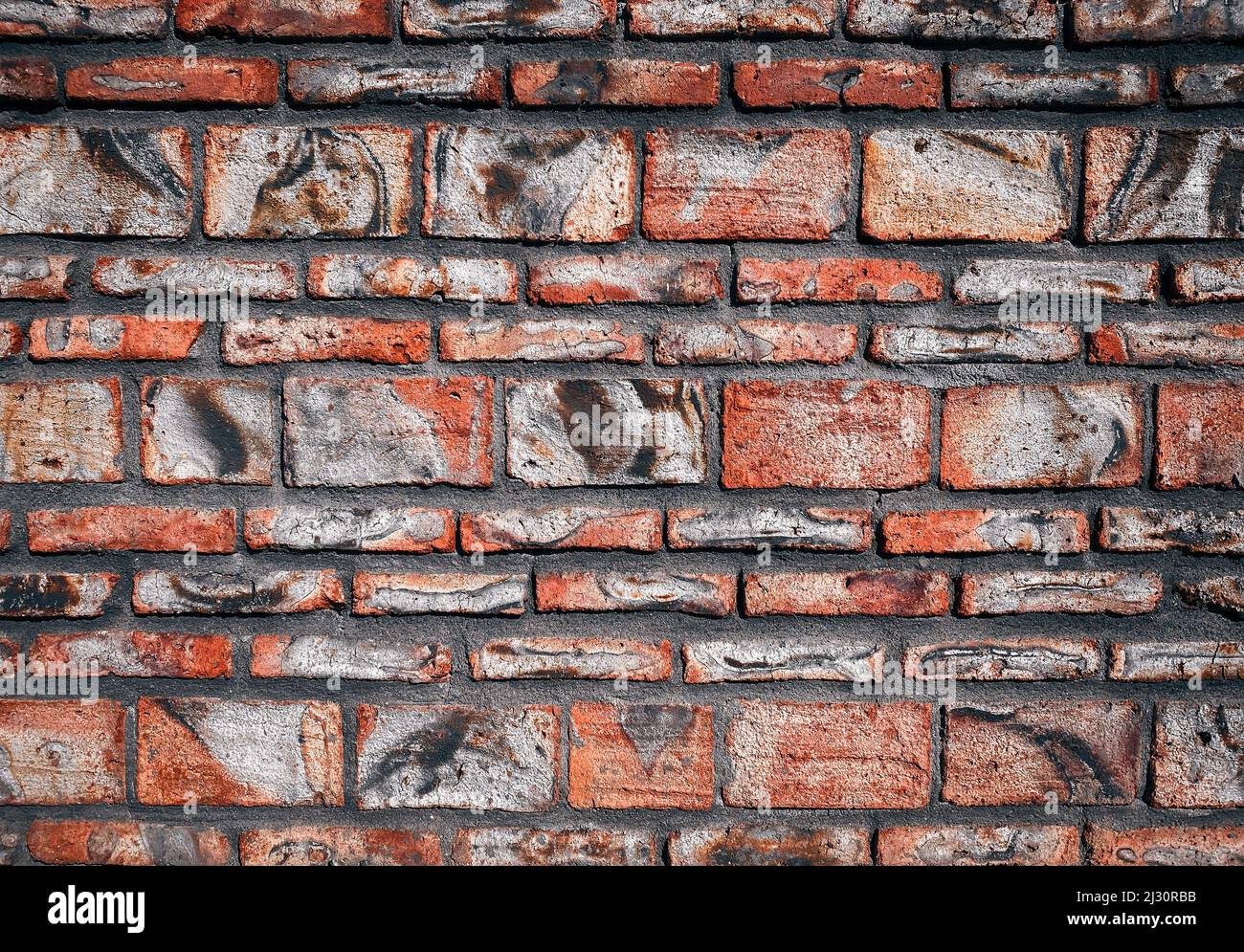 a mexican style red orange brick stone garden wall structure backyard ...