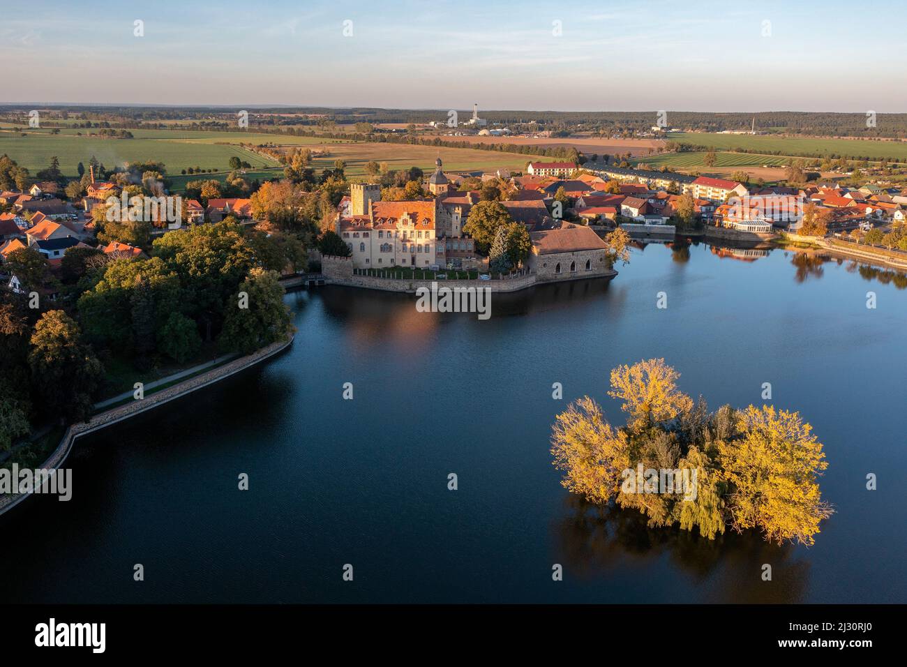 Flechtingen moated castle in the evening sun, built in the 13th century ...