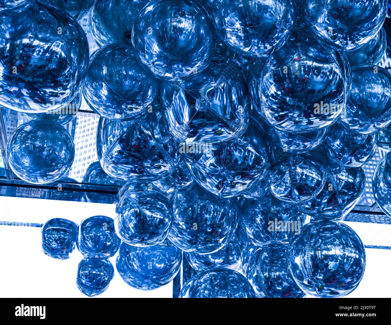 balloons floating in a room at the Summit One Vanderbilt Stock Photo ...