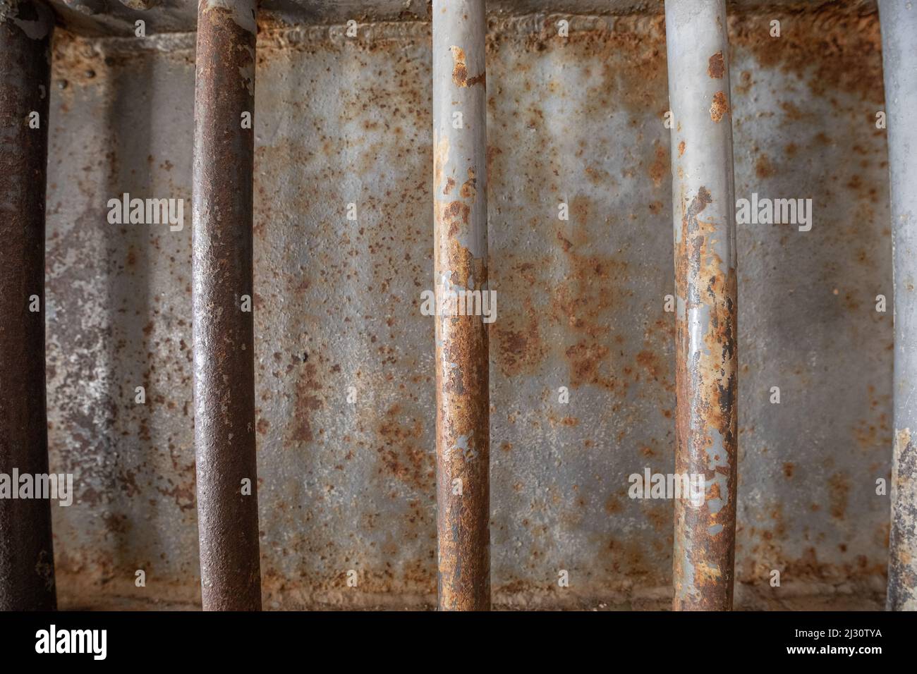 Old walls with iron bars that are rusting Stock Photo - Alamy