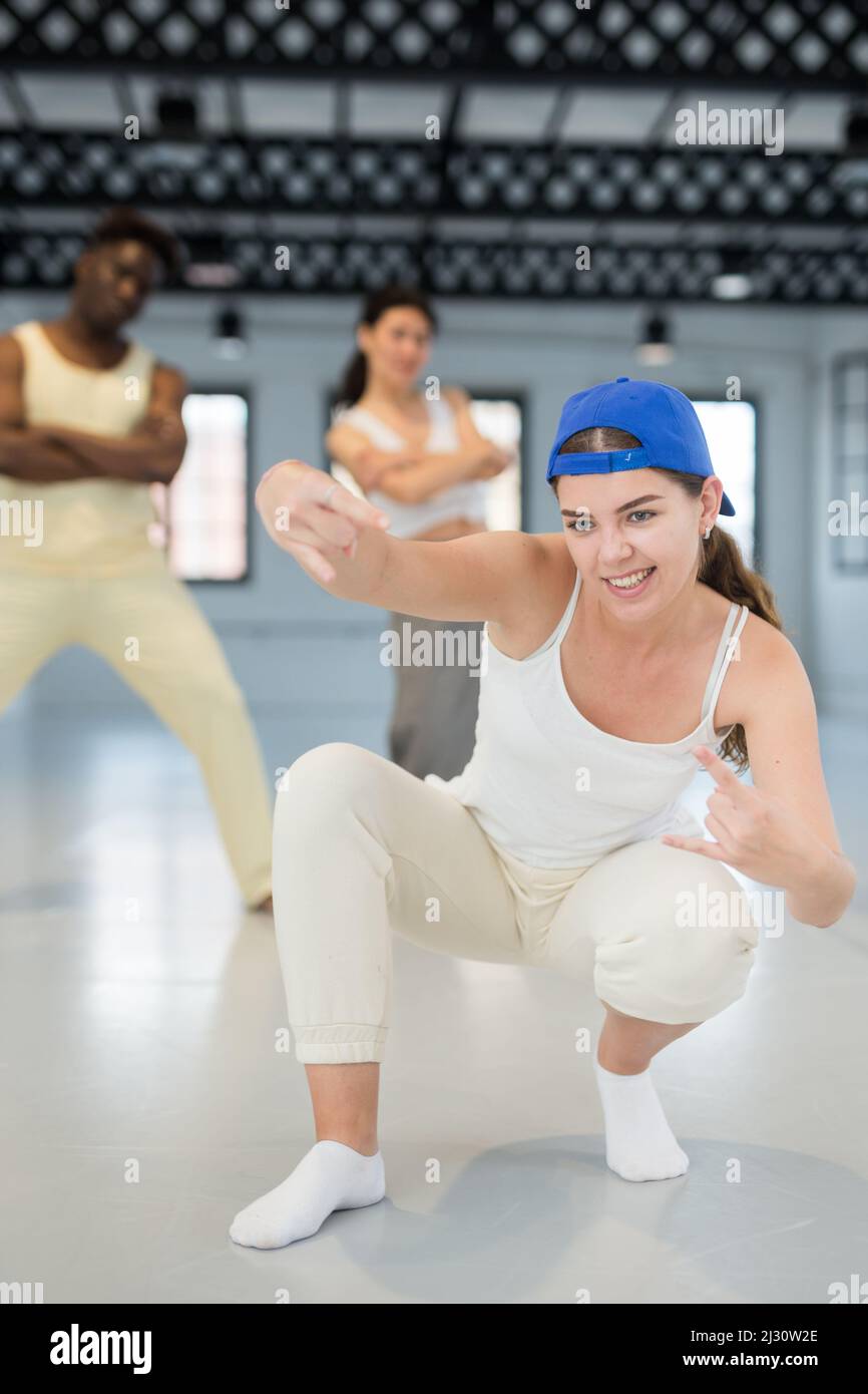 Young beautiful female dancer enjoying dancing break dance Stock Photo ...