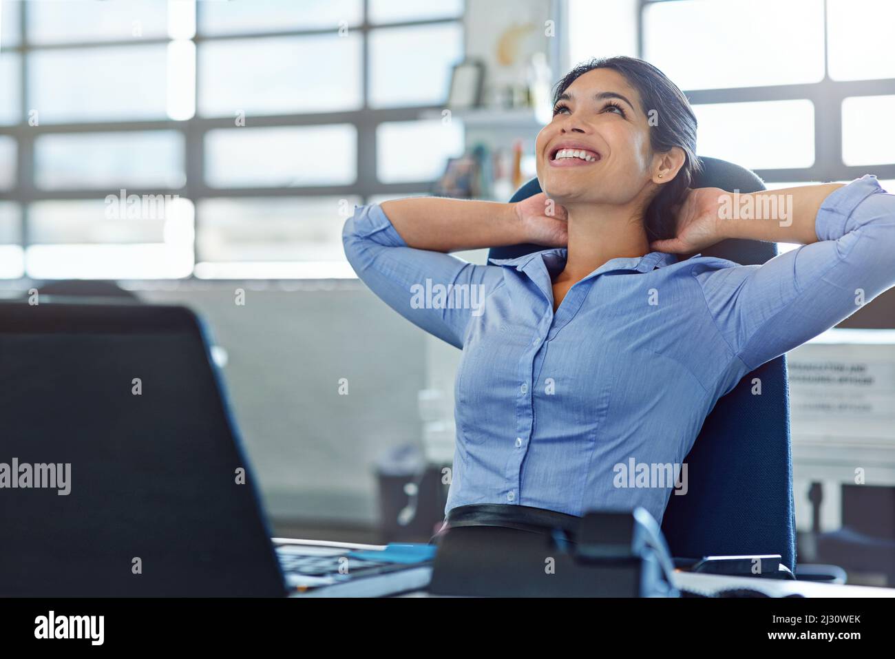 Relaxing feeling business woman sitting hi-res stock photography and ...