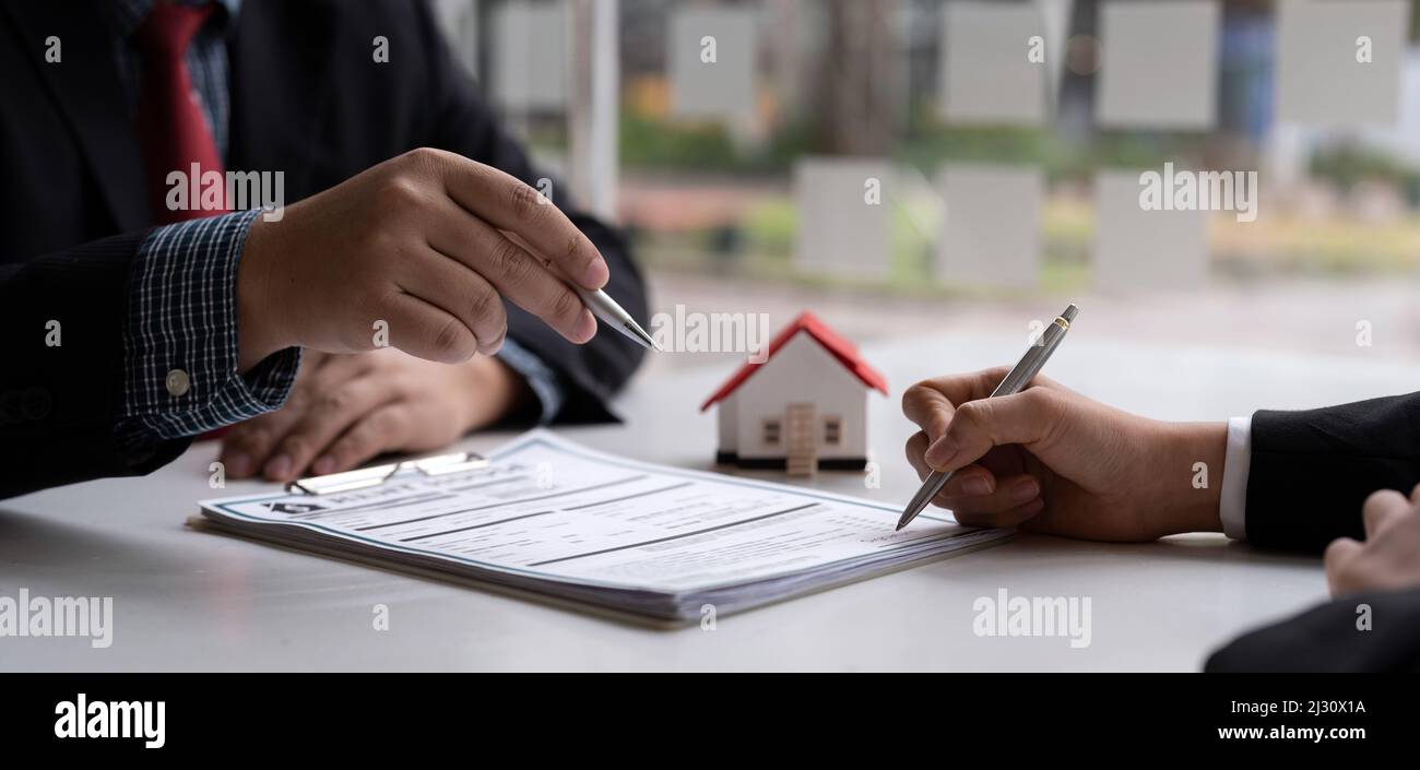 Signing loan bank hi-res stock photography and images - Alamy