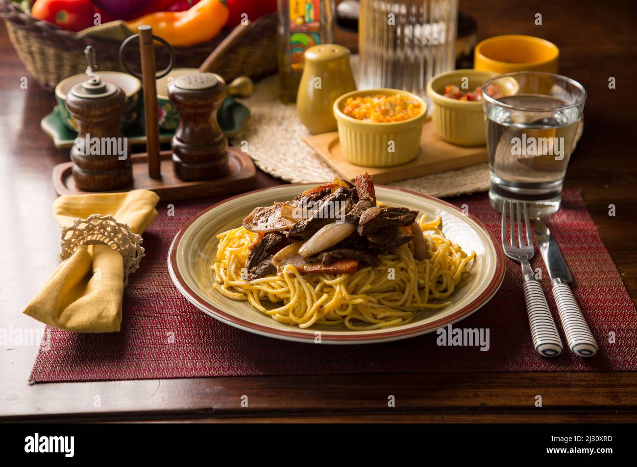 Huancaina noodle pasta with lomo saltado sauted beef meat Peruvian ...